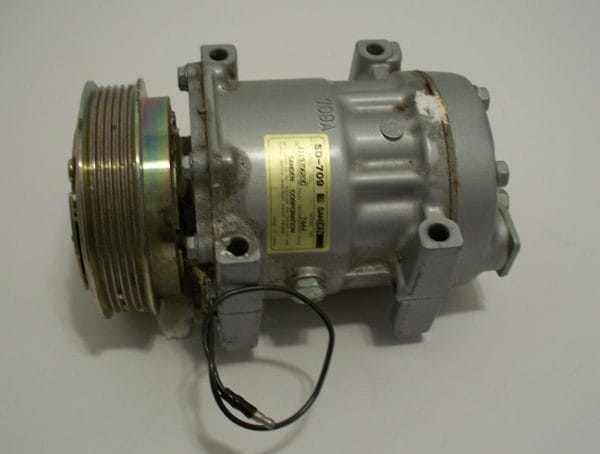 This is a Sanden Compressor SD-709 Model 7444 New/Old Stock
